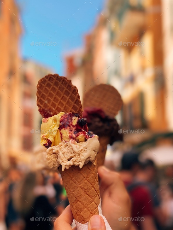 Italian ice cream cones held in hands Stock Photo by David_Tanke ...