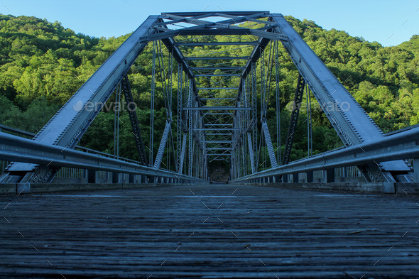 Truss bridge at sunset Stock Photo by hokietim | PhotoDune