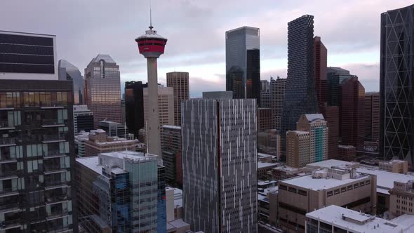 City downtown Calgary skyscrapers space needle winter snow rising ...