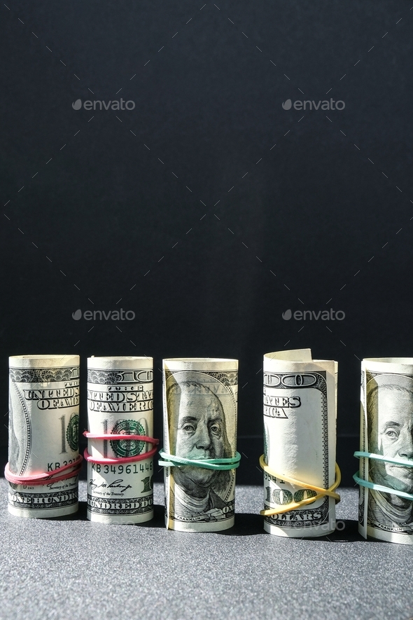 US dollars bundle close up isolated on dollar background. Paper ...
