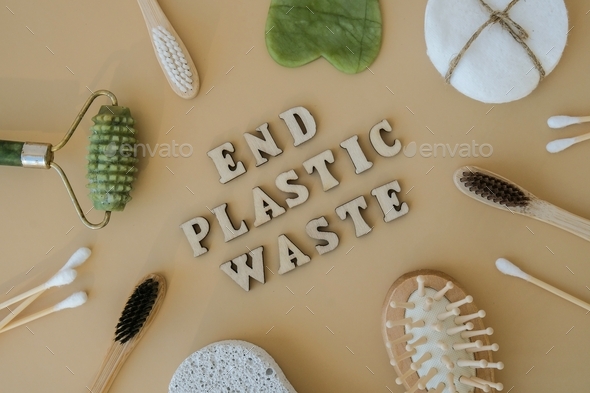 END PLASTIC WASTE text around Natural skin care products on neutral ...