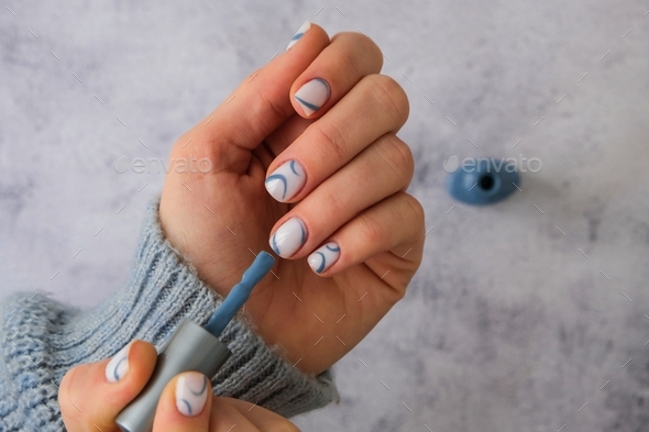 Professional stylish trendy blue Hardware Manicure. Procedure for the ...