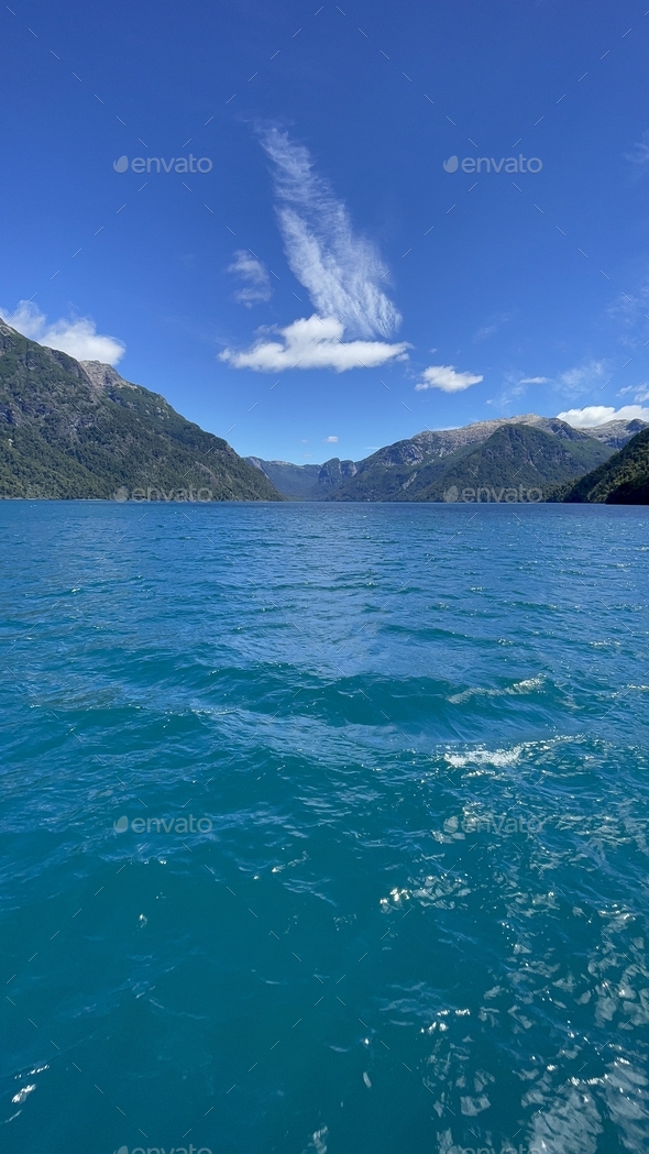 On a boat in a giant beautiful blue lake during summertime. Stock Photo ...