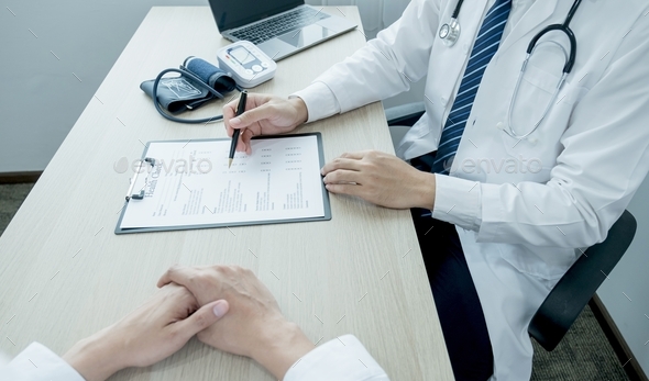 doctor hand write report and explained health examination results to ...