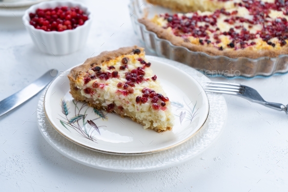 Homemade round pie on the table. Curd tart. Open pie with red berries ...