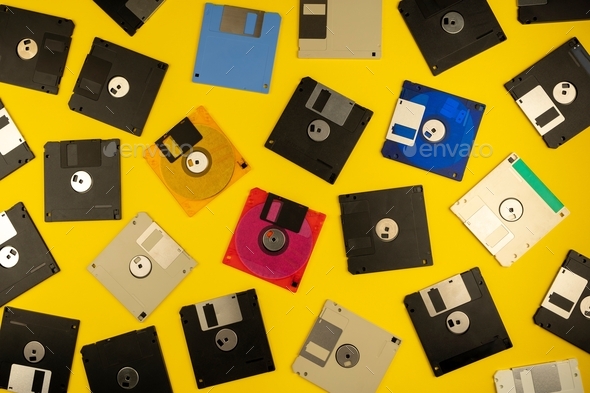 Old diskette. Background from multicolored old flip flop floppies ...