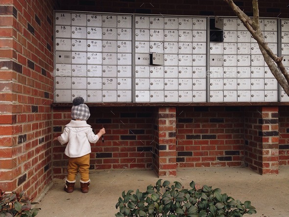Child checking the mail Stock Photo by BrittneyLeighAnn | PhotoDune