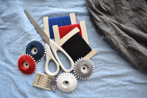 Sewing tools on clothes. Stock Photo by Maliflower73 | PhotoDune