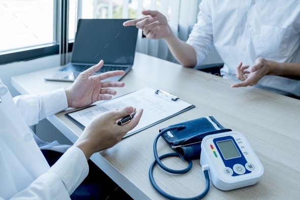 The doctor hand write report and explained the health examination ...