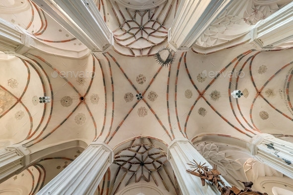 interior dome and looking up into a old gothic or baroque catholic ...