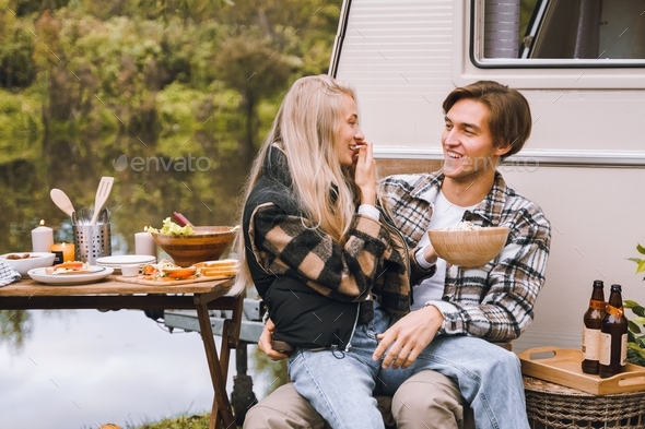 Young just married couple traveling in camper,house on wheels,trailer ...