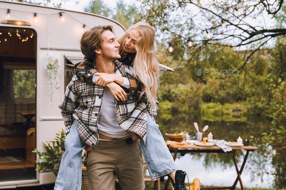 Young just married couple traveling in camper,house on wheels,trailer ...