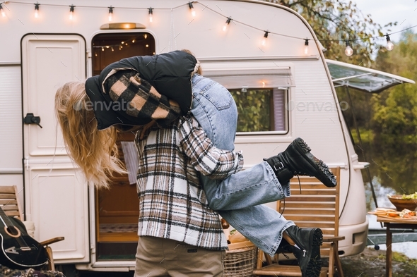 Young just married couple traveling in camper,house on wheels,trailer ...