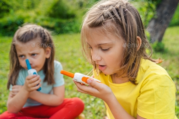 Small kids,girls play in walkie-talkie.Walkie Talkies with channels ...