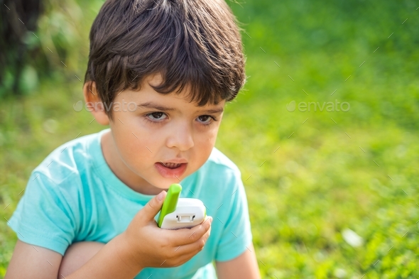 Small boy,kid,child play in walkie-talkie.Walkie Talkies with channels ...