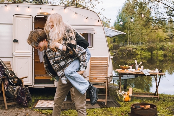 Young just married couple traveling in camper,house on wheels,trailer ...