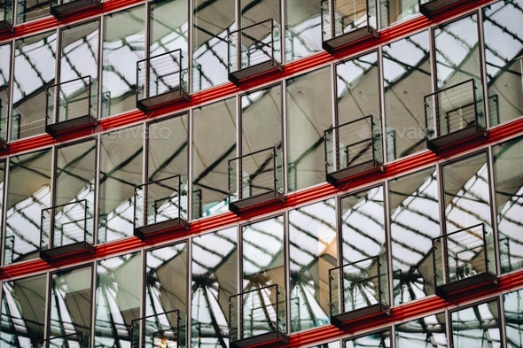 A repeating pattern of windows on a skyscraper for business ...