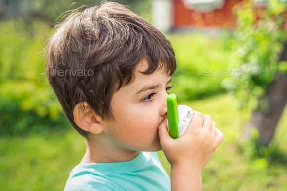 Small boy,kid,child play in walkie-talkie.Walkie Talkies with channels ...