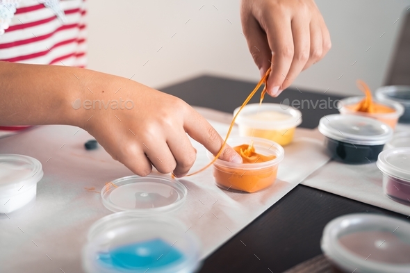 Little girls sculpt figurines crafts from air plasticine, modeling ...