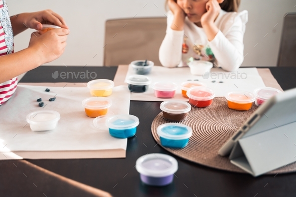 Little girls sculpt figurines crafts from air plasticine, modeling ...