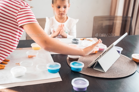 Little girls sculpt figurines crafts from air plasticine, modeling ...