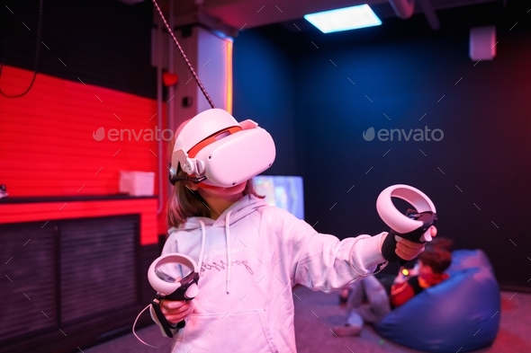Girl playing vr game in 3d glasses headset. Virtual reality simulation ...