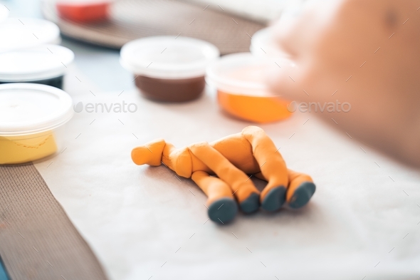 Little girls sculpt figurines crafts from air plasticine, modeling ...