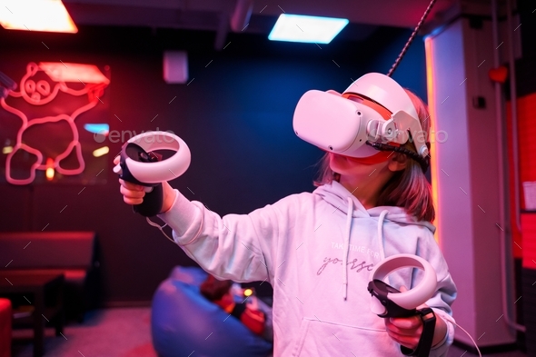 Girl playing vr game in 3d glasses headset.Virtual reality simulation ...
