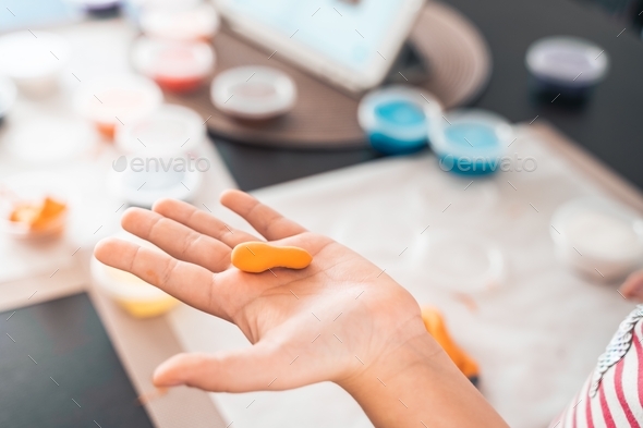 Little girls sculpt figurines crafts from air plasticine, modeling ...