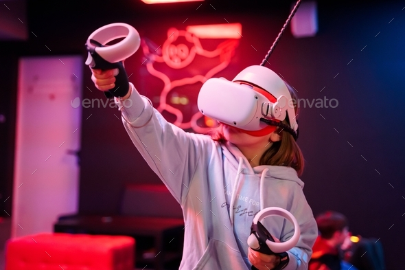 Girl playing vr game in 3d glasses headset.Virtual reality simulation ...