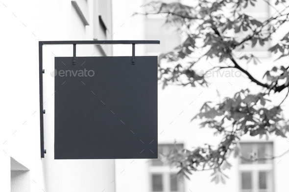 Black and white empty outdoor signage mockup to add company logo ...