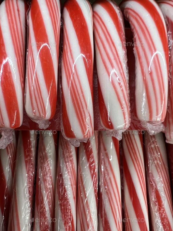 candy canes in a rows close up Stock Photo by bethanyellis28 | PhotoDune