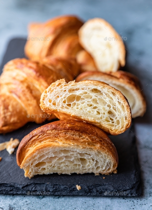 Cut in half croissant with inside texture and thin crisp layers ...