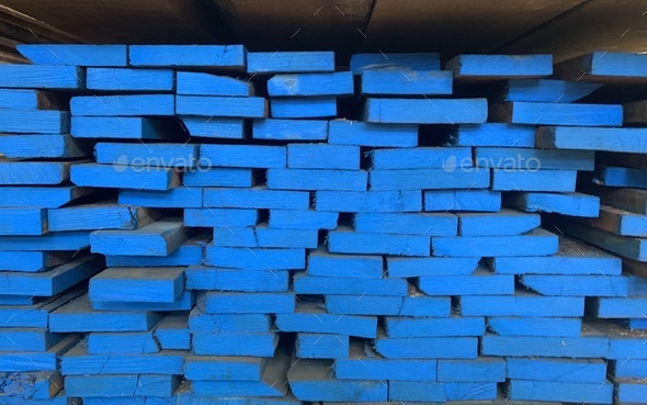 Stack of wood lumber planks in blue color paint Stock Photo by statuslapa