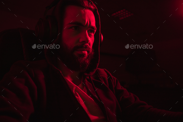 Bearded hacker in dark room Stock Photo by kegfire | PhotoDune