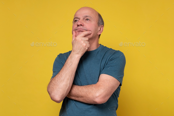 Senior man scratching his chin making a hard decision Stock Photo by ...