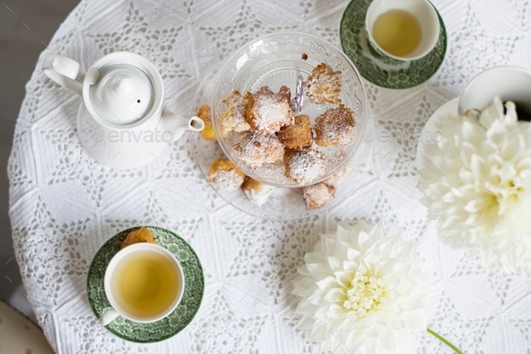 tea break at a beautifully served table with homemade cakes, flatlay ...