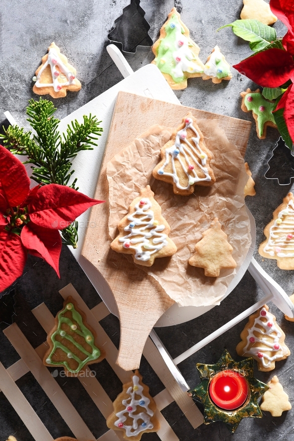Christmas shortbread with colorful icing, winter holiday spirit, flat ...