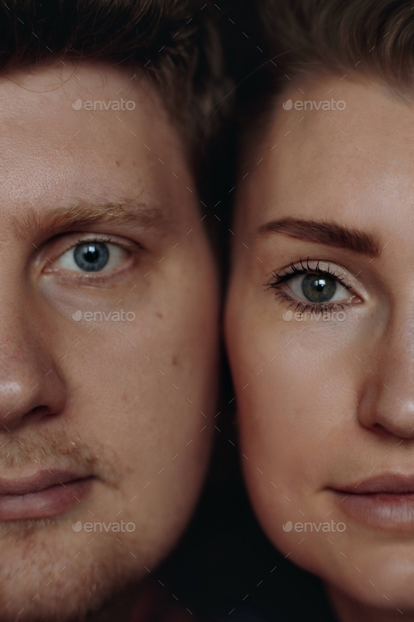 close up portrait of half faces of woman and man Stock Photo by uraneva