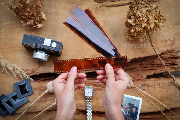 Retro and vintage stuff. Old camera, camera film, old photographs ...