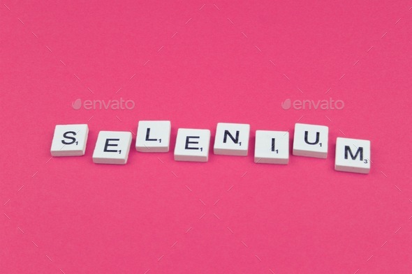 Selenium scrabble letters word on a pink background Stock Photo by ...