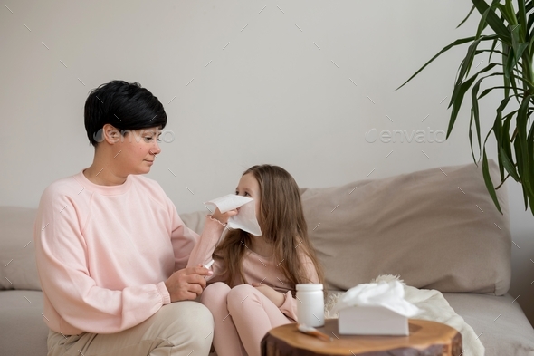 The girl has a very stuffy nose Stock Photo by arkhangelovaoksana ...