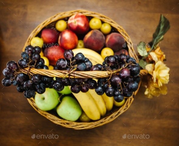 Basket of fruits top view Stock Photo by Lemnaouer | PhotoDune