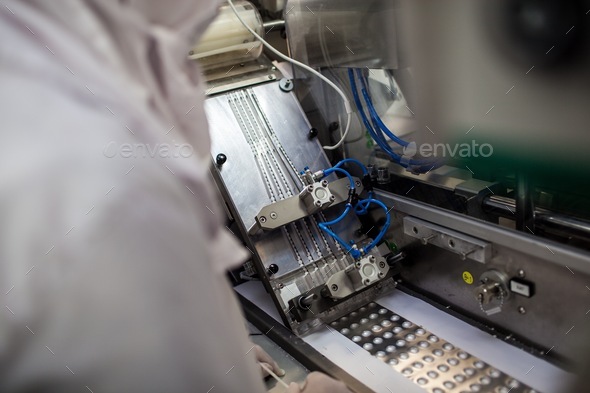 Man operating machine Stock Photo by Lemnaouer | PhotoDune