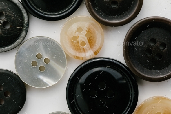 Closeup on flat lay of clothing buttons on a white background Stock ...