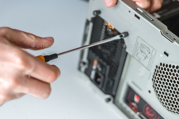 Repair and modernization of computers. Installing the power supply in ...