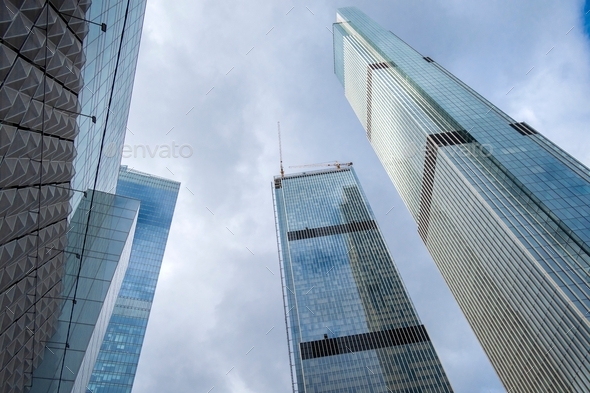 Skyscrapers modern architecture office building with clouds in blue sky ...