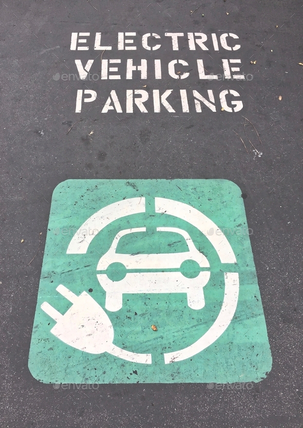 Designated Electric vehicle parking space with words and symbols ...