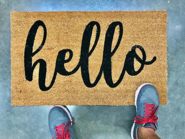 Welcoming welcome mat that says hello to make people feel happy and ...