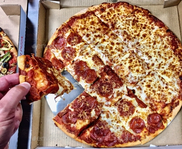 Getting take-out pizza! Go ahead, take any slice you want! Stock Photo ...
